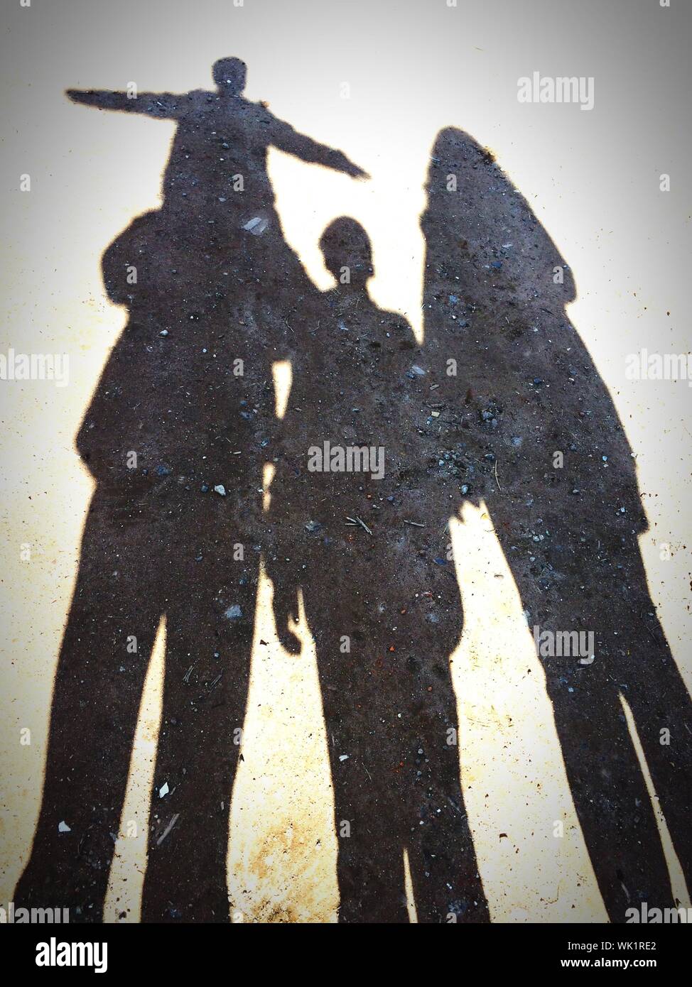Family shadow hi-res stock photography and images - Alamy