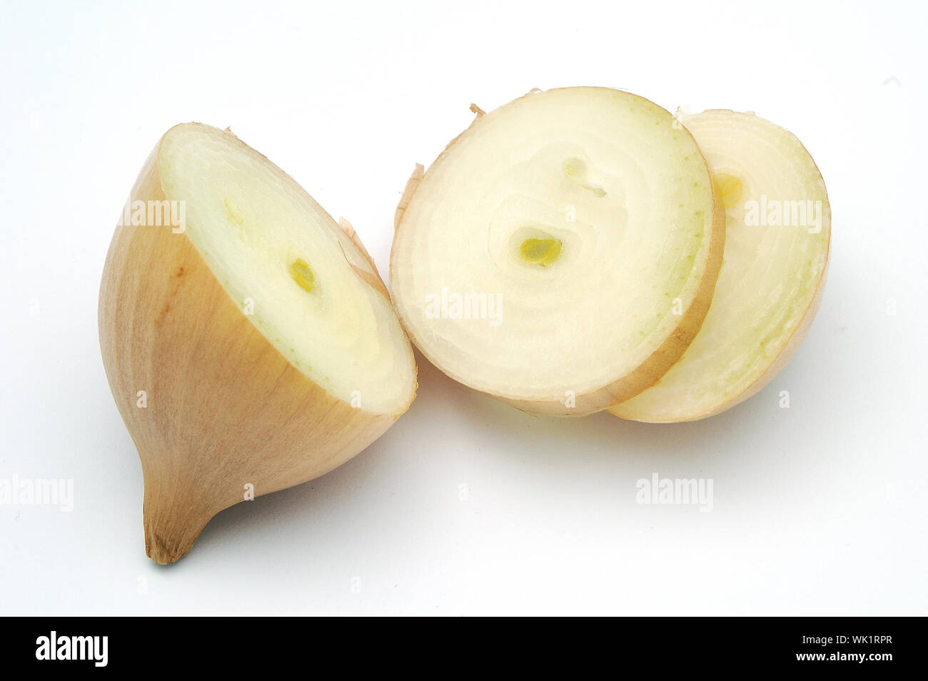 Some onions on the white background Stock Photo - Alamy