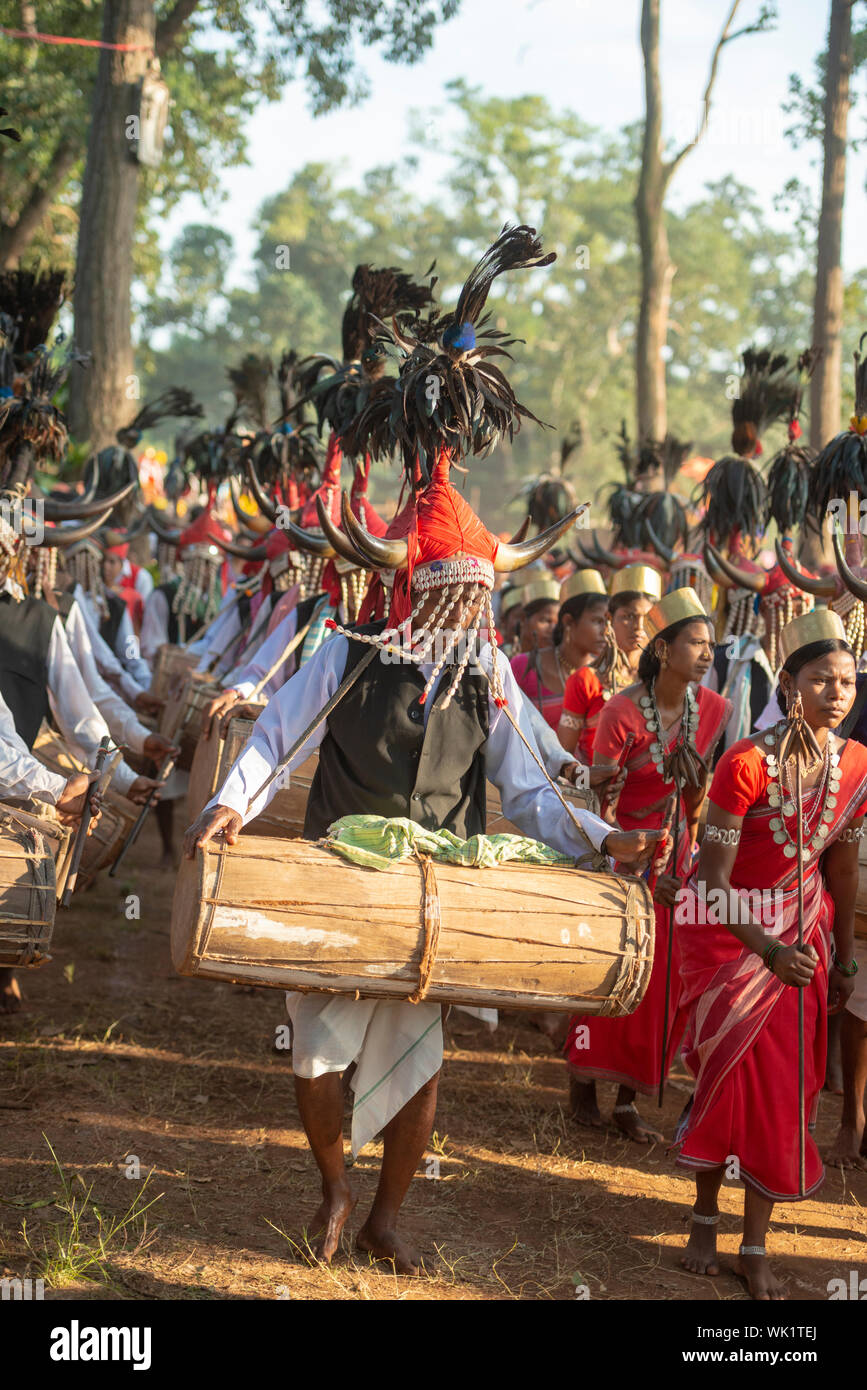 Tribal Man and woman dancing and beating dhols in traditional Attire ...