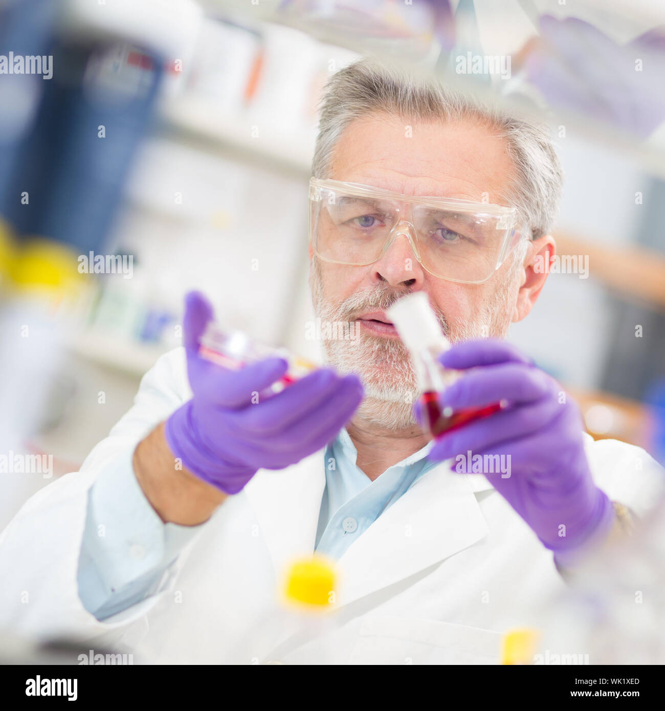 Life scientist researching in laboratory. Life sciences comprise fields ...