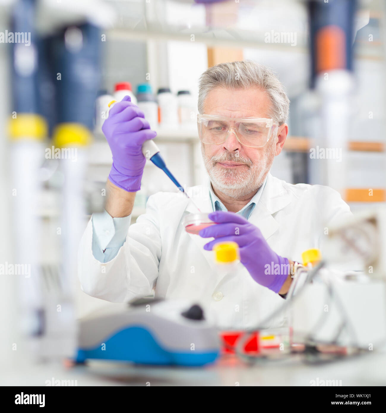 Life scientist researching in laboratory. Life sciences comprise fields ...