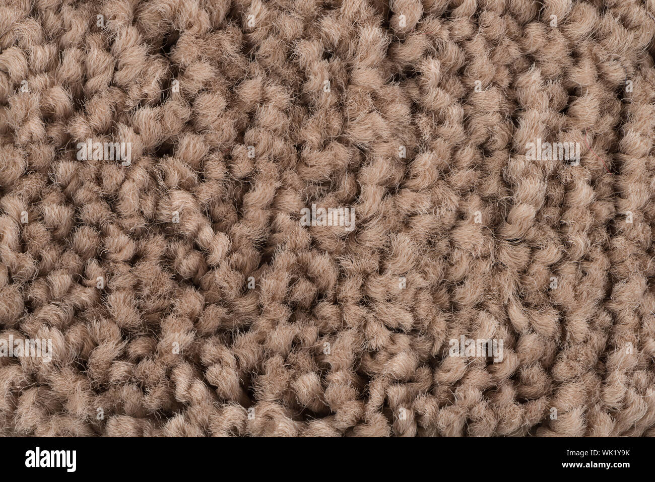 Closeup detail of brown carpet texture background Stock Photo - Alamy