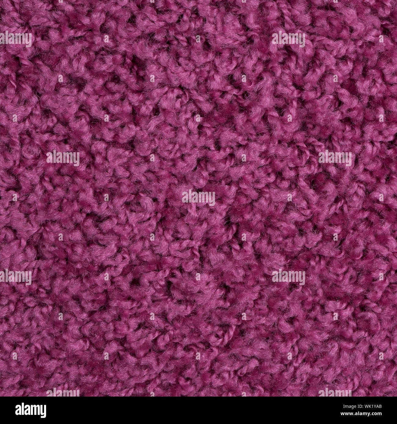 Closeup detail of purple carpet texture background Stock Photo - Alamy