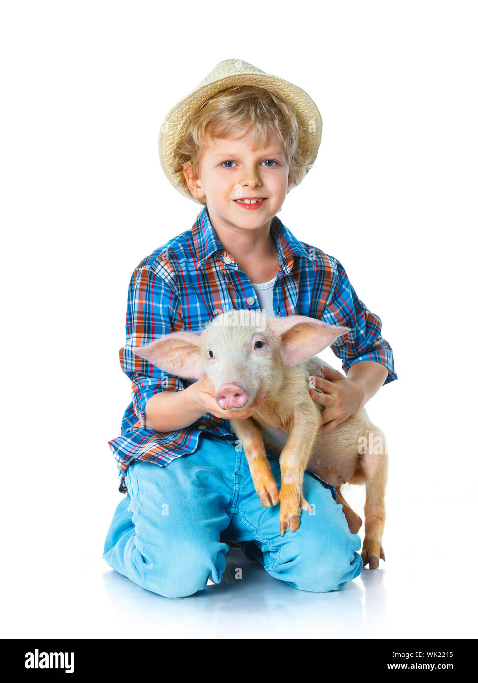 Boy feeding pig hi-res stock photography and images - Alamy