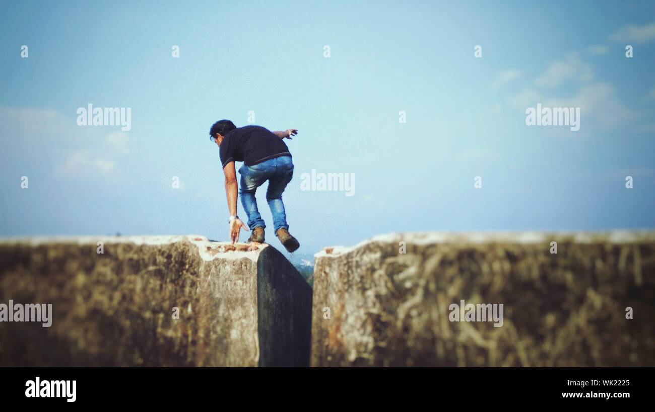 Jumping over the wall hi-res stock photography and images - Alamy