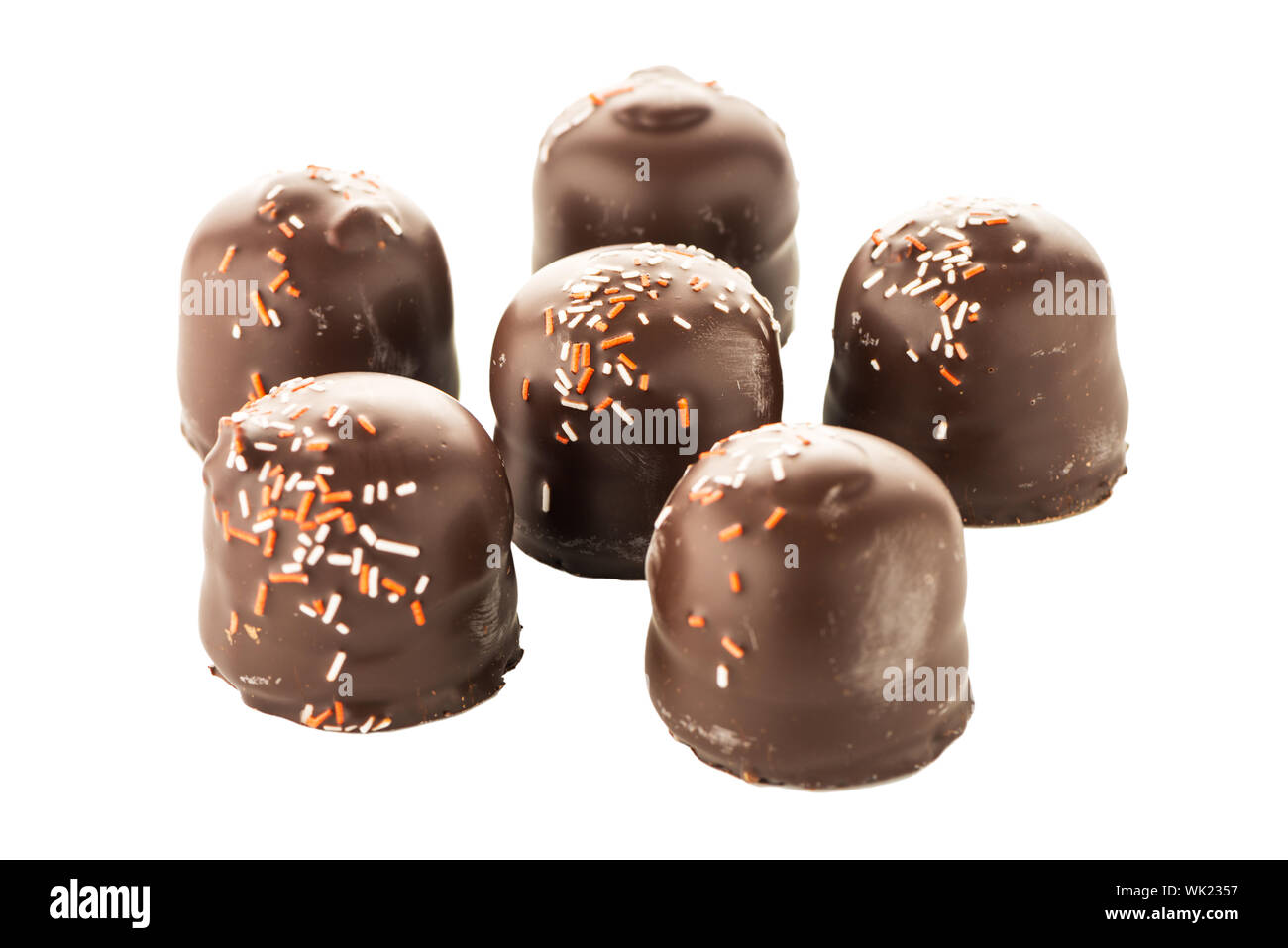 Chocolate coated marshmallows isolated on white background Stock Photo ...