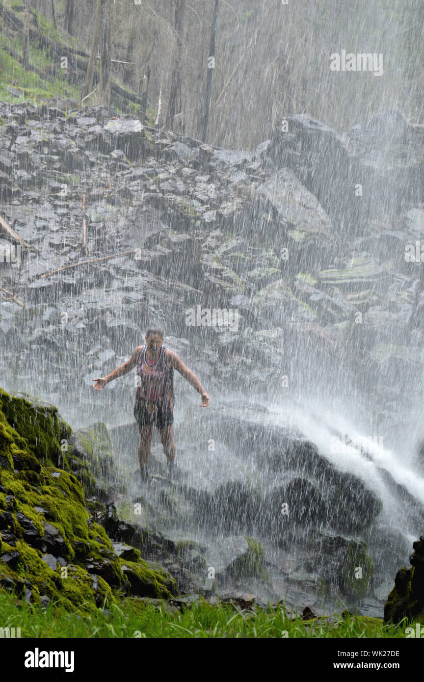 Woman Under Waterfall High Resolution Stock Photography and Images - Alamy