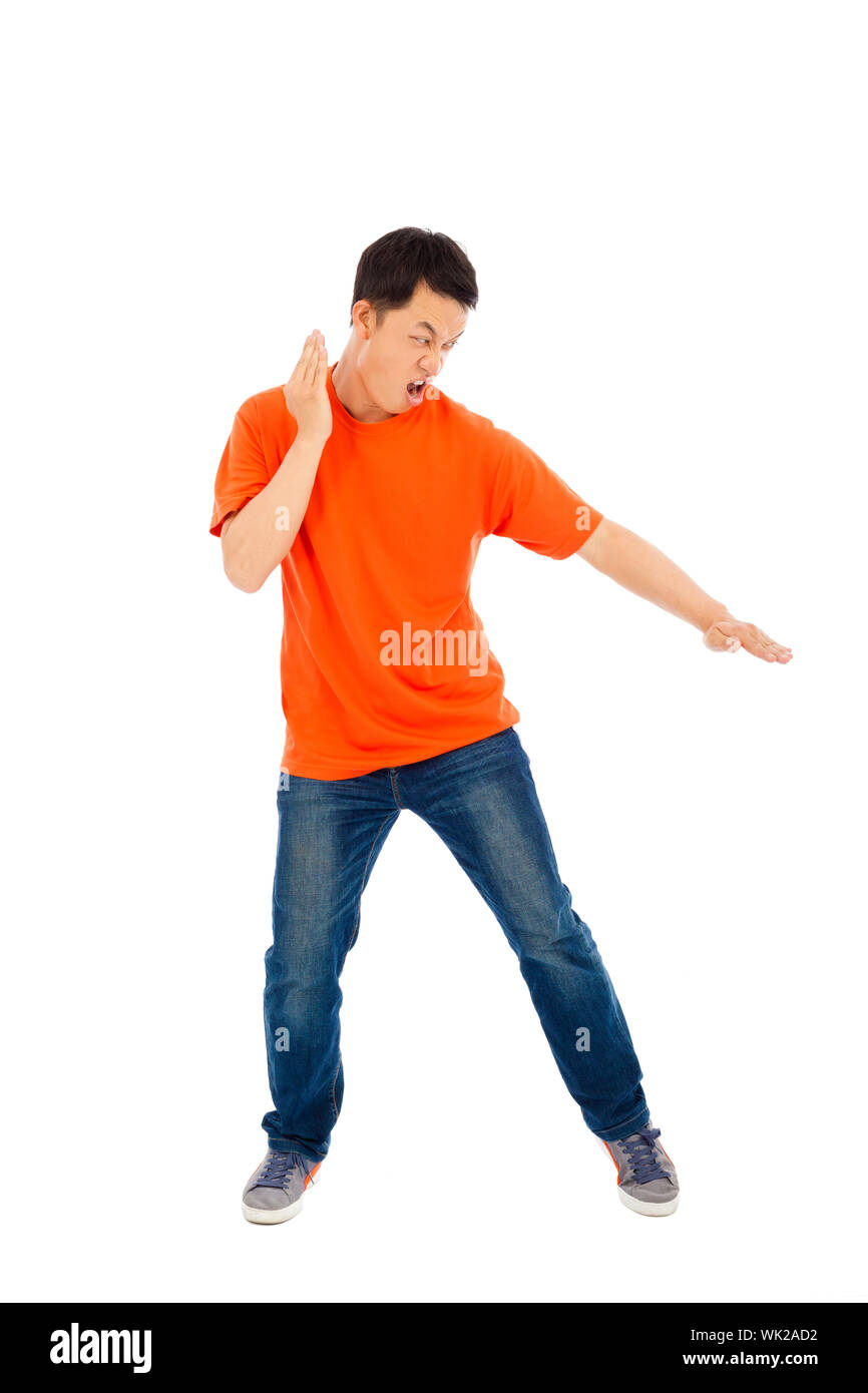 young man imitate a karate expert with fight stance Stock Photo - Alamy