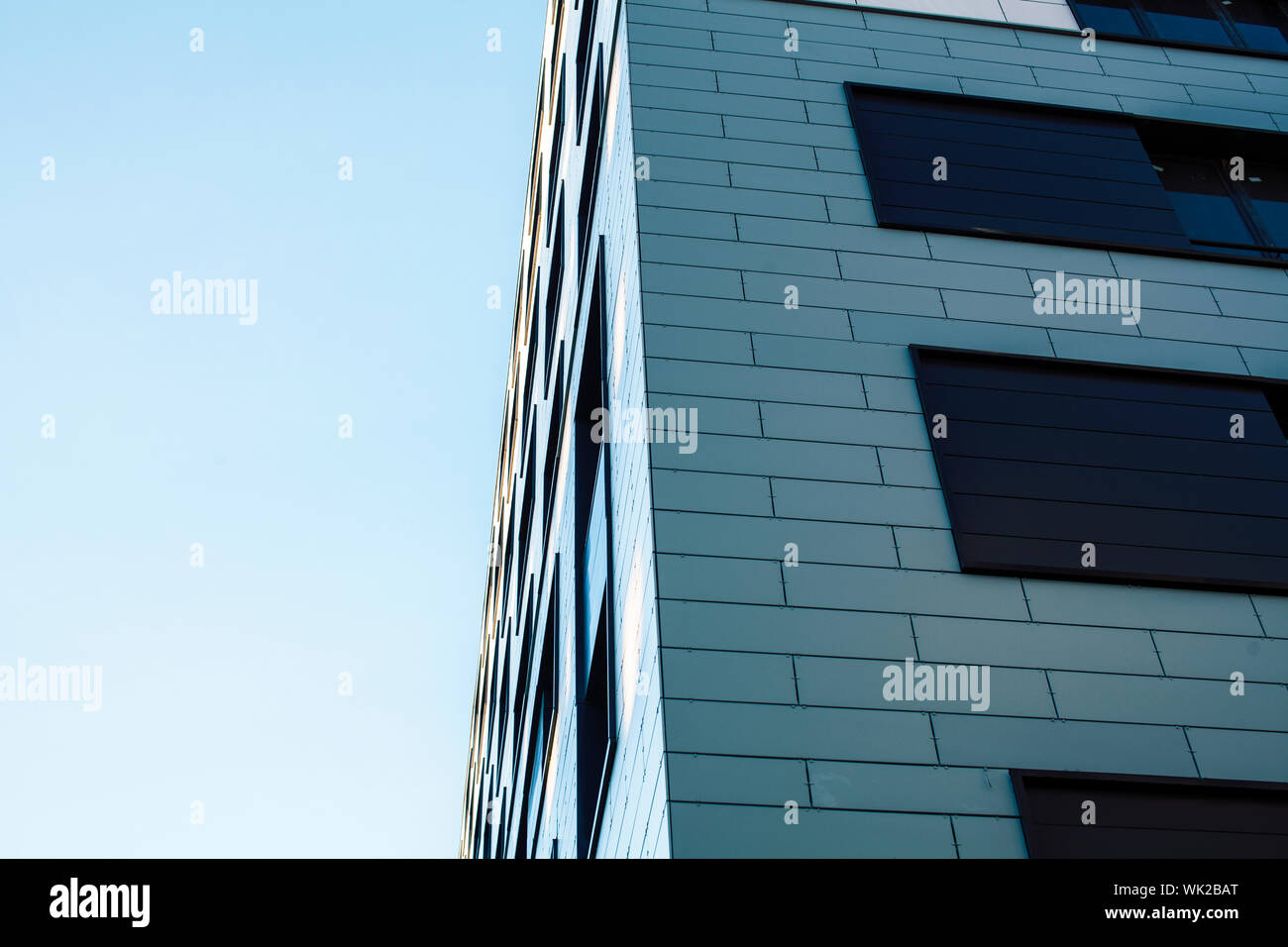 view on new modern buildings, facade corner and sky, real houses on ...