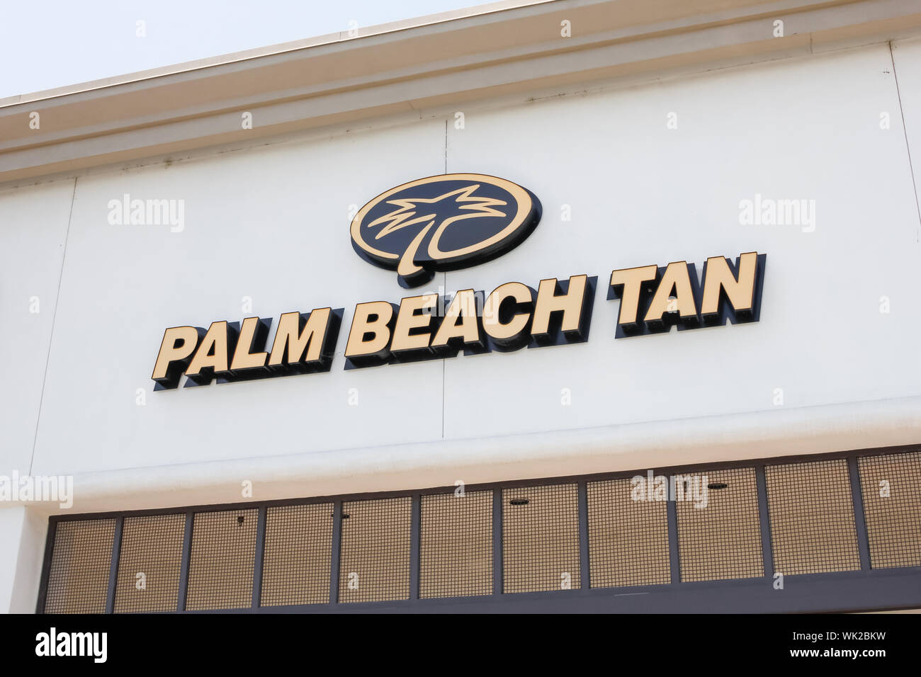 A store front sign for the tanning salon known as Palm Beach Tan Stock ...