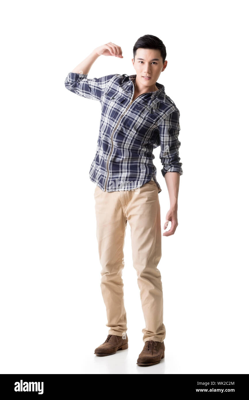 Asian young guy carry or take something, full length model isolated on ...