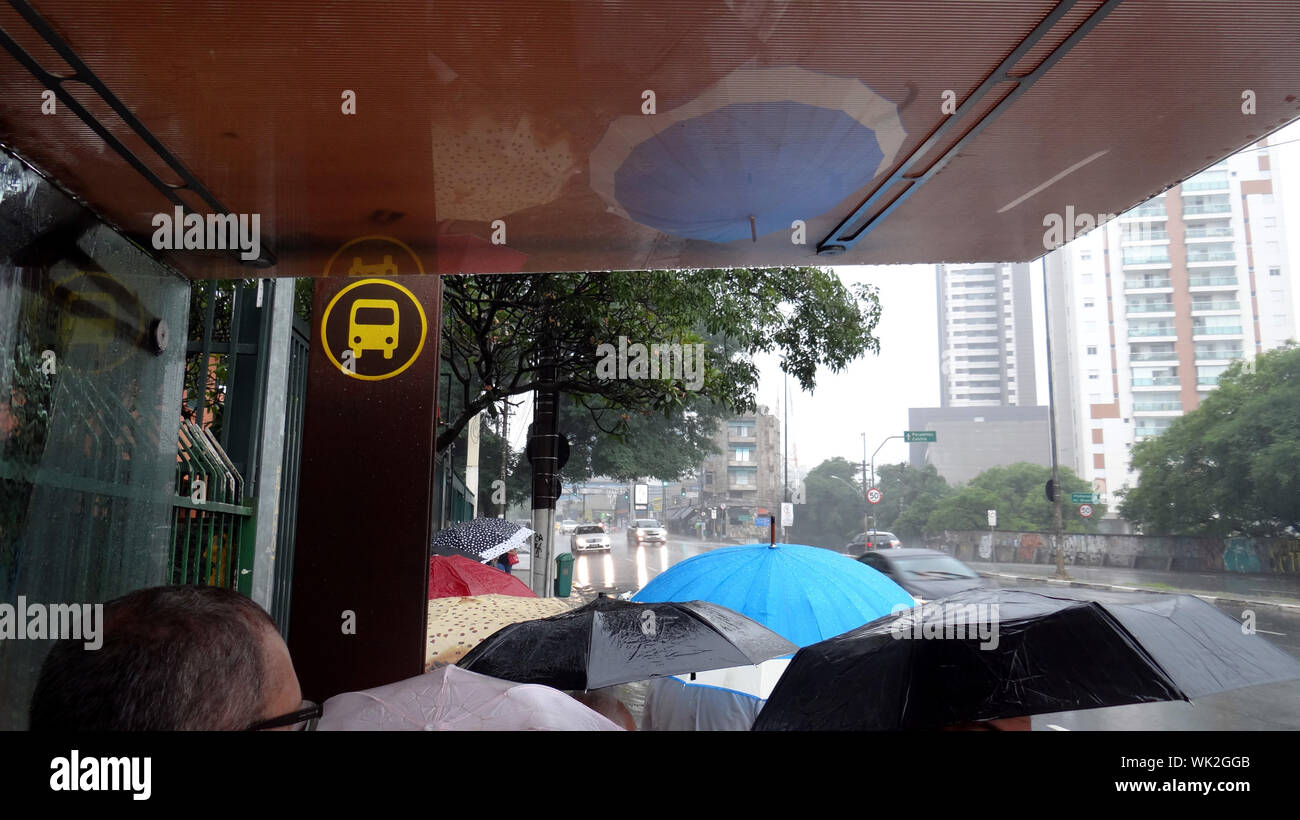Bus stop in the rain hi-res stock photography and images - Alamy