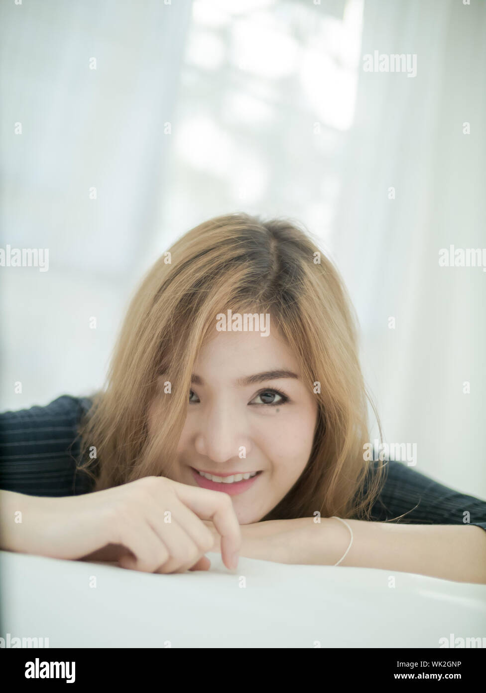 Woman leaning hi-res stock photography and images - Alamy