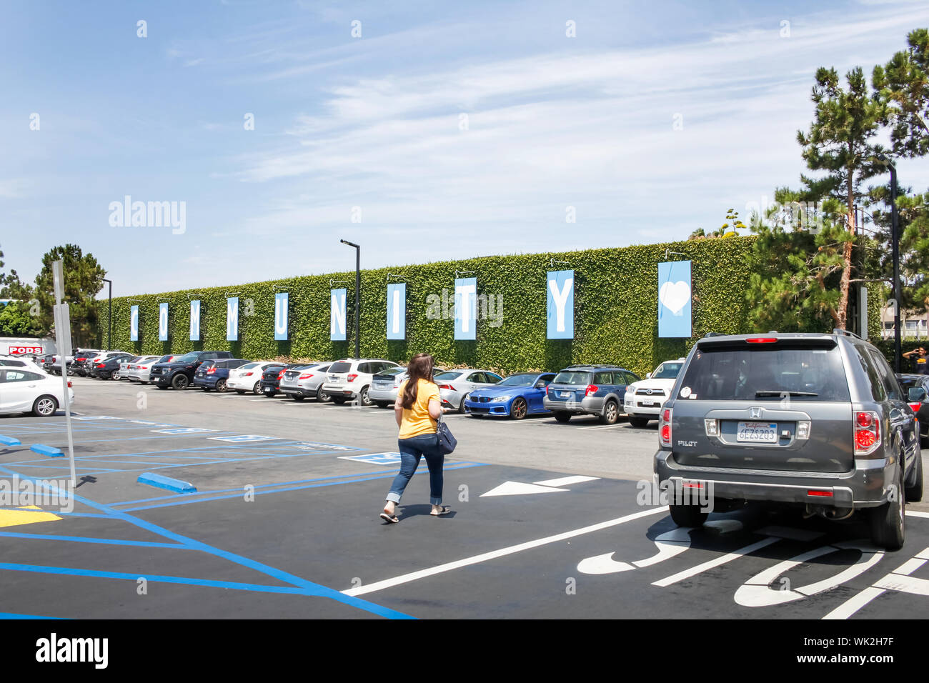 A decor sign that says Community, located in the parking lot of The ...