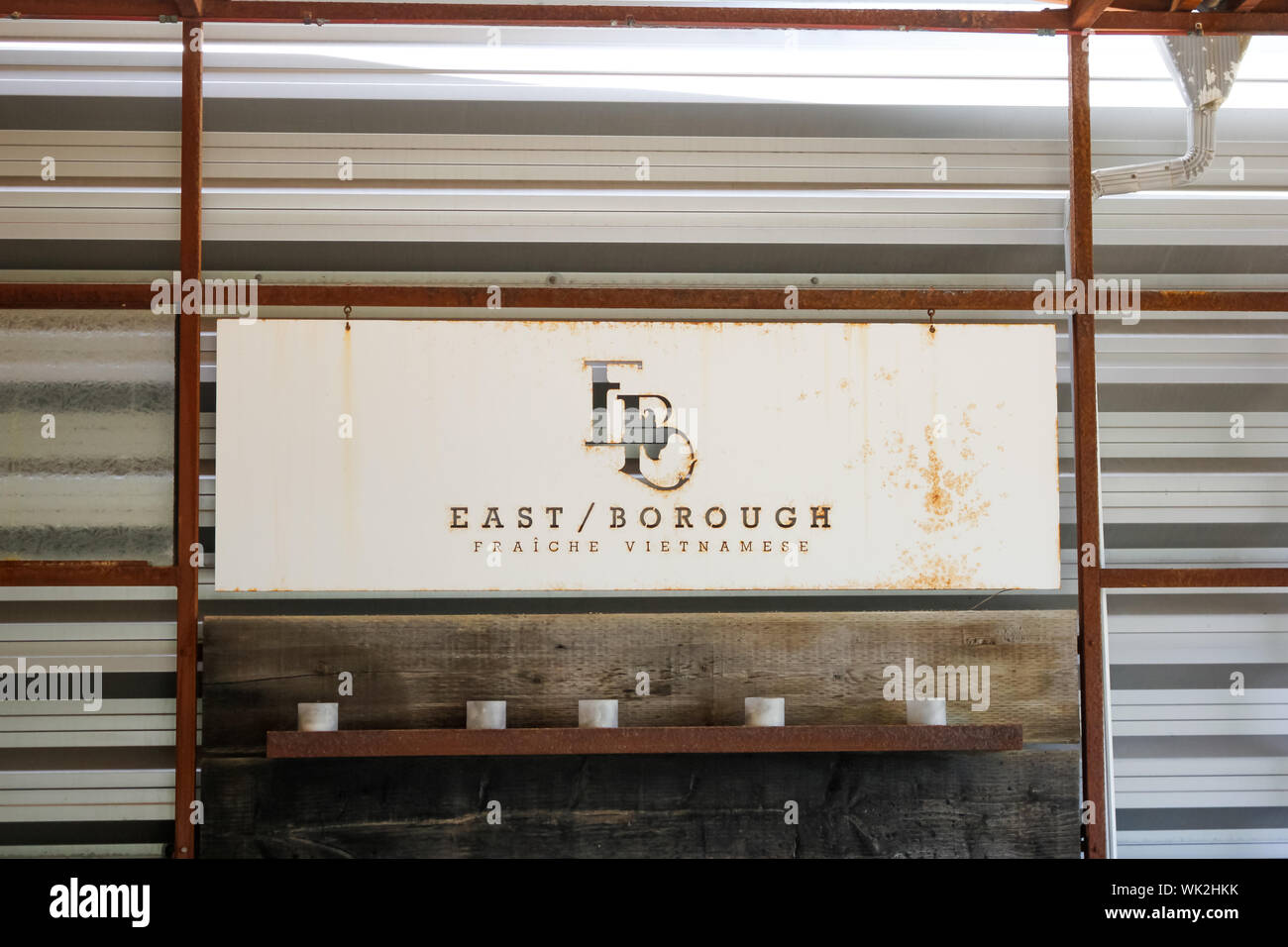 A store front sign for the modern Vietnamese restaurant known as East ...