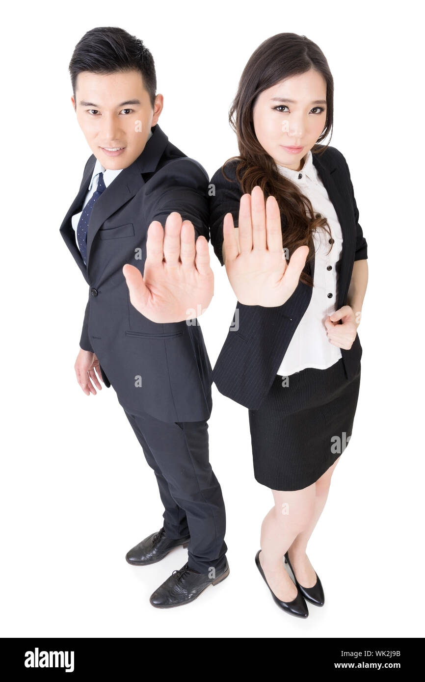 Business man and woman give you a gesture of stop, full length portrait ...