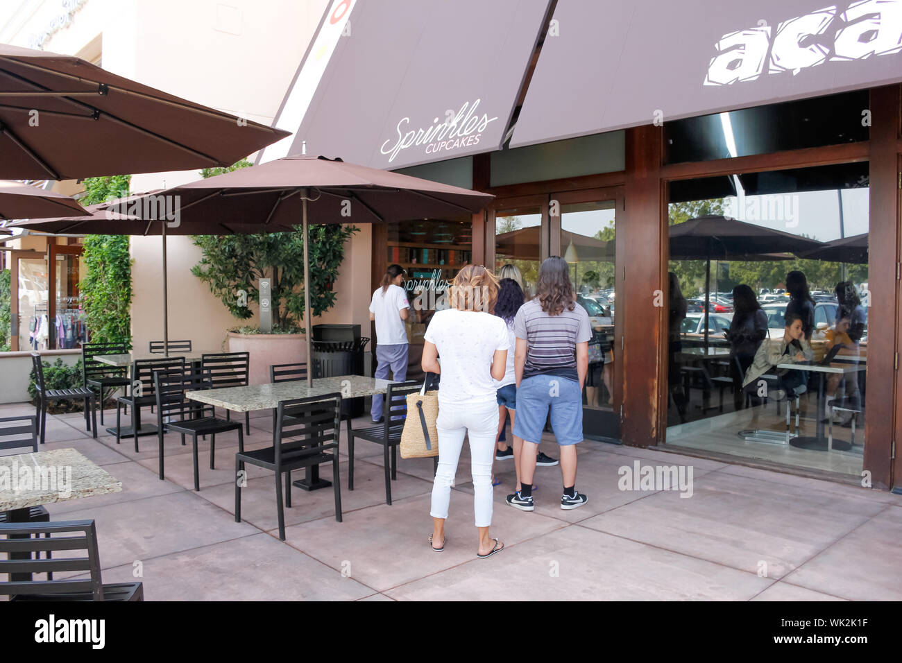 A store front sign for the dessert shop known as Sprinkles Cupcakes ...