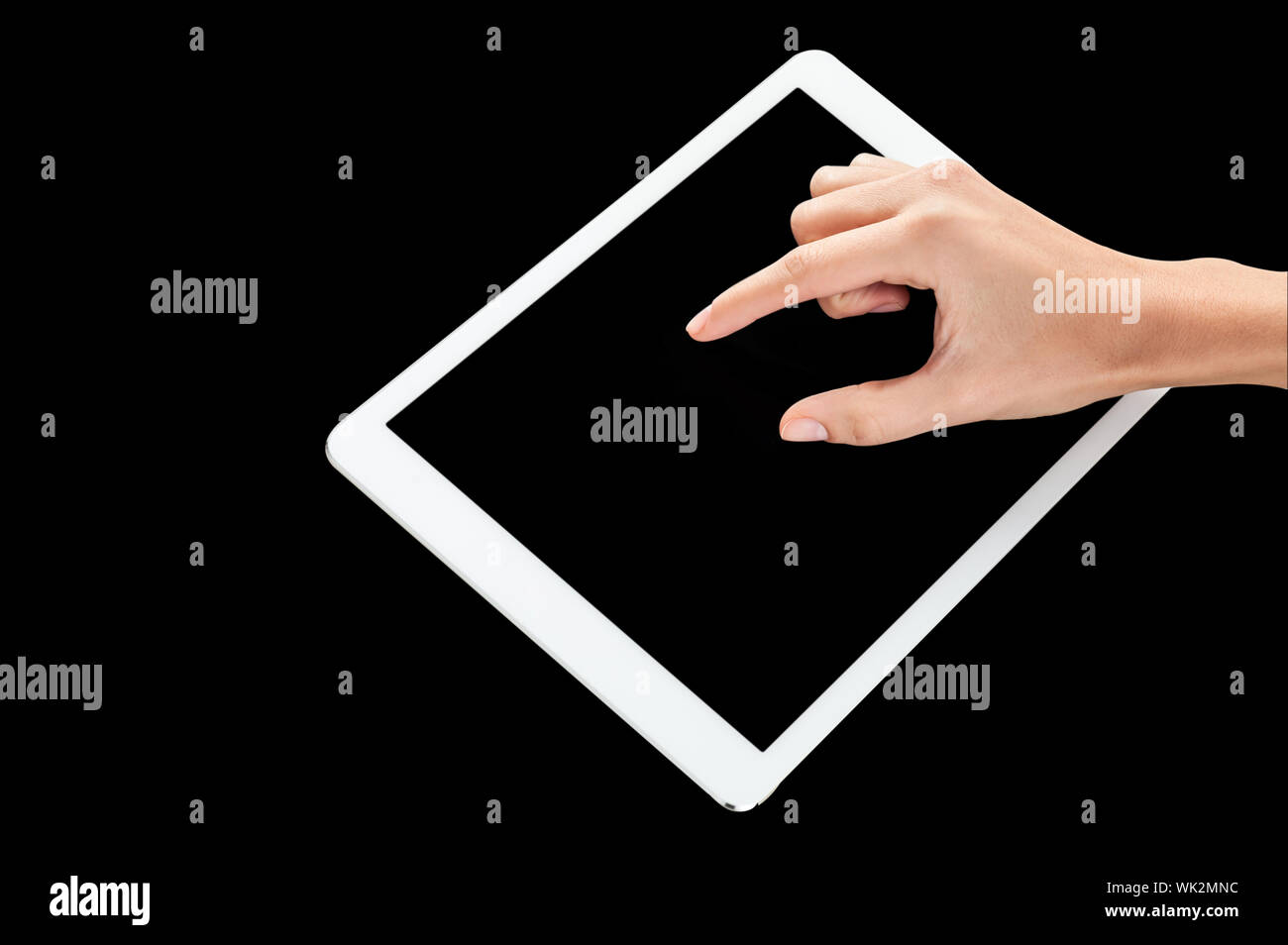 Finger pointing on tablet pc screen Stock Photo - Alamy
