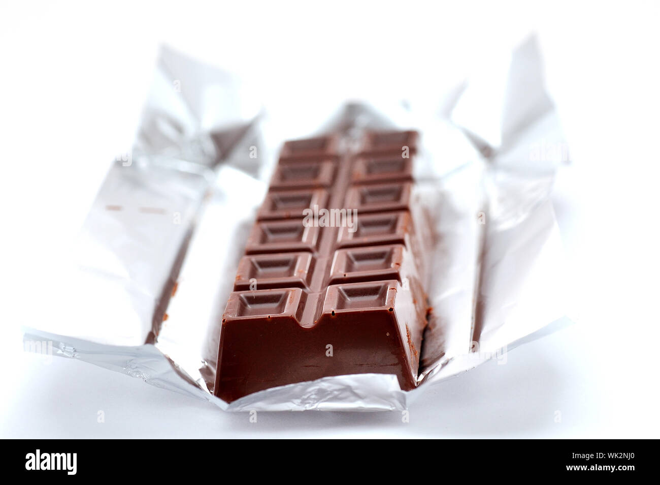 Chocolate plate on the foil Stock Photo - Alamy