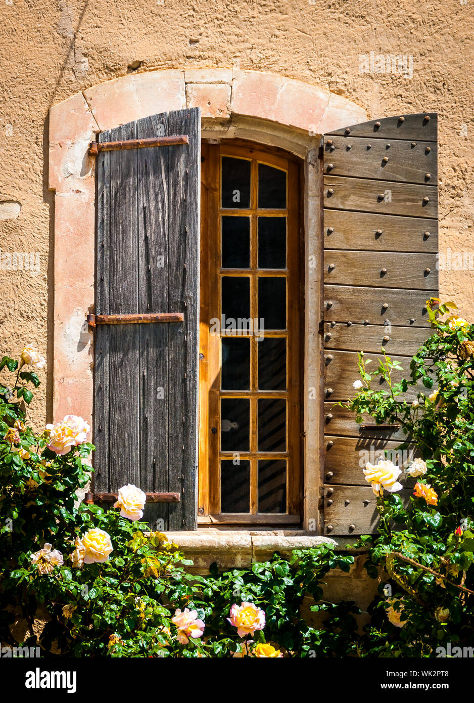 Detail of old vintage wooden window with wild roses, Provence, France ...