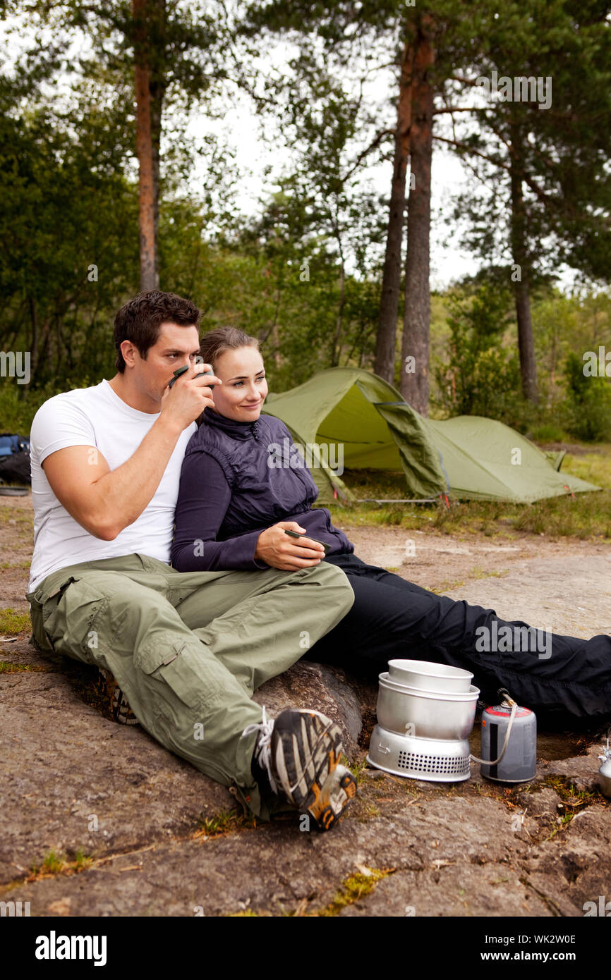 Man woman cook food camping hi-res stock photography and images - Alamy