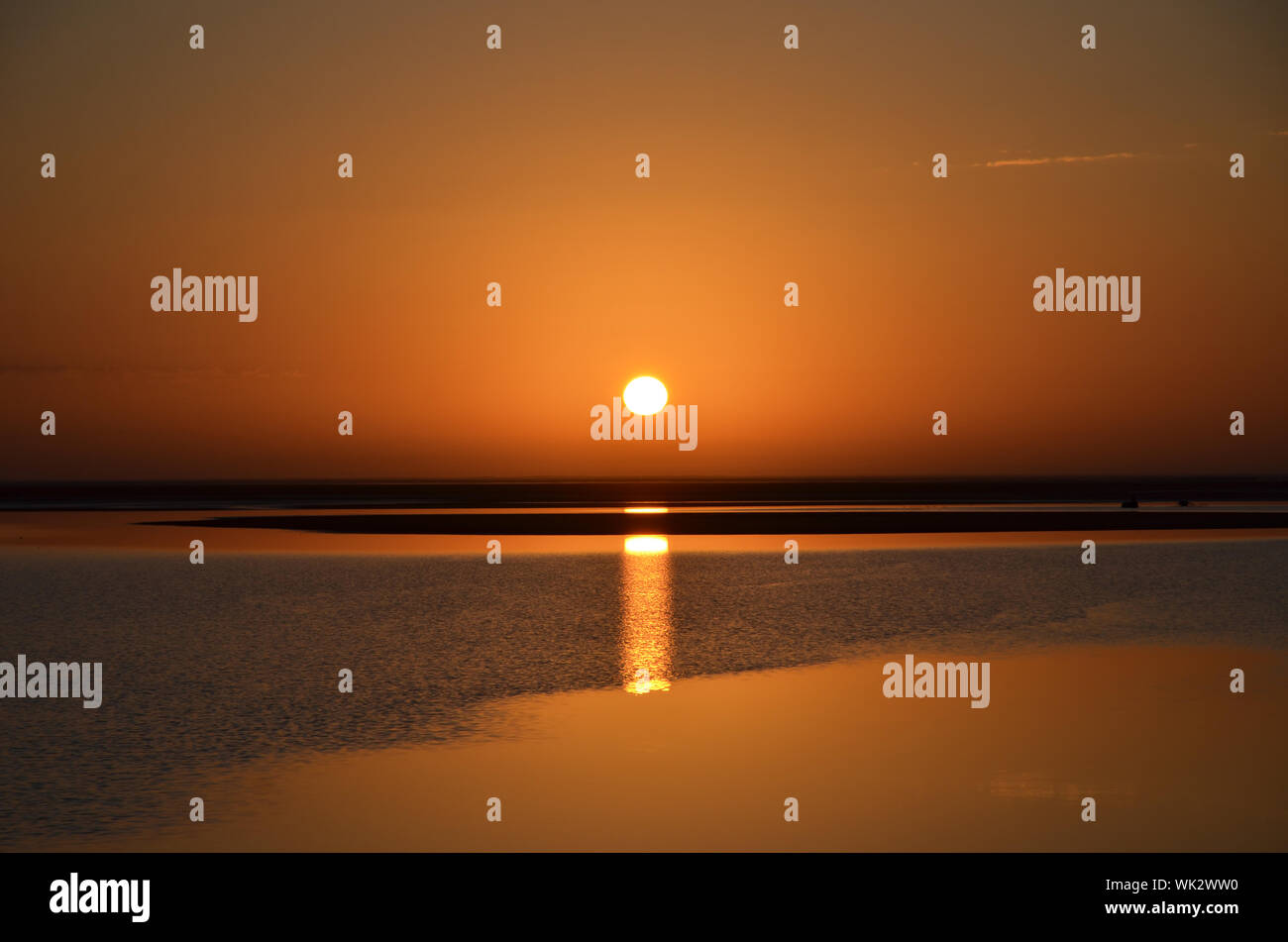 African lake Chott el Jerid at sunset Stock Photo - Alamy