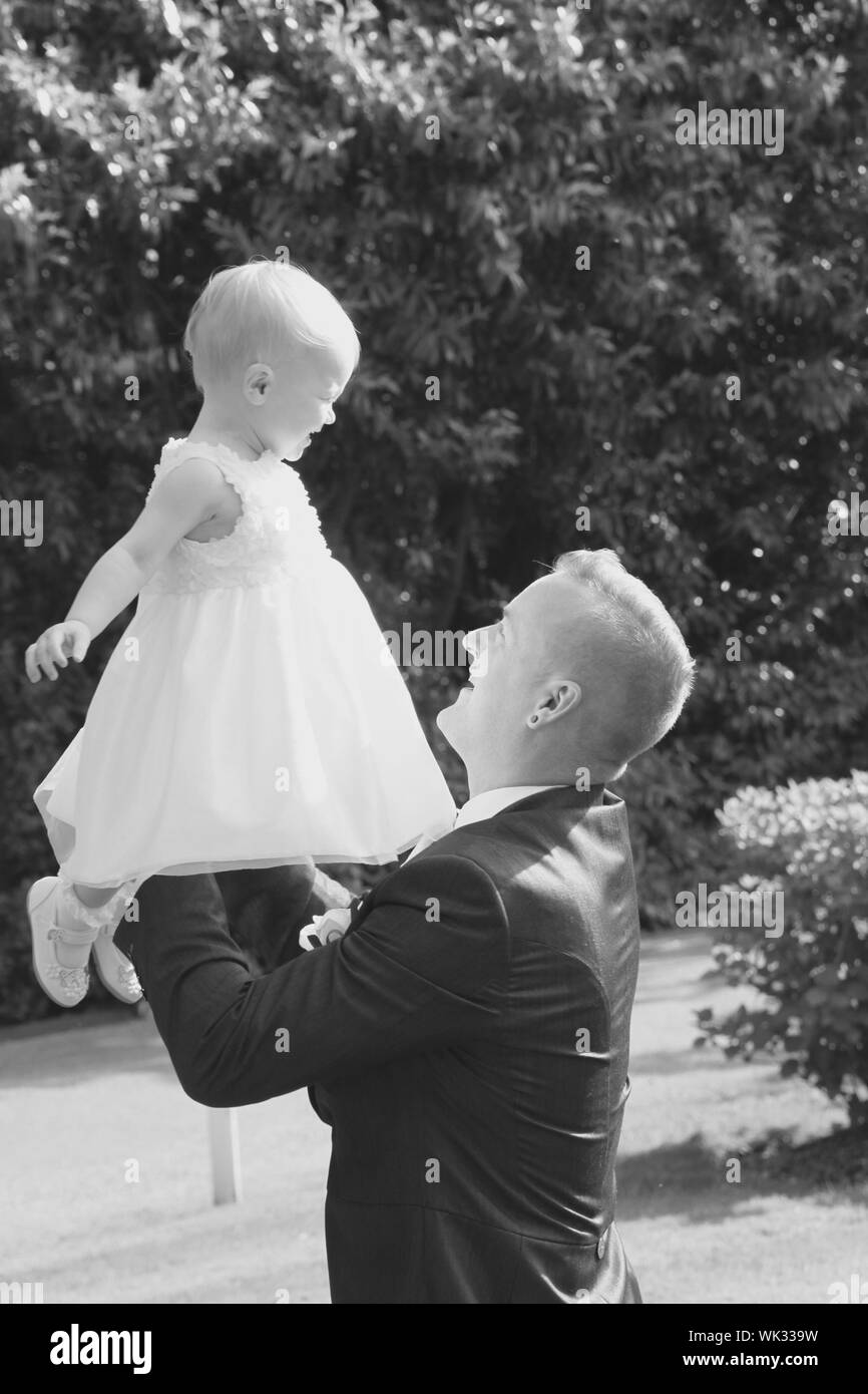 Father lifting daughter hi-res stock photography and images - Alamy