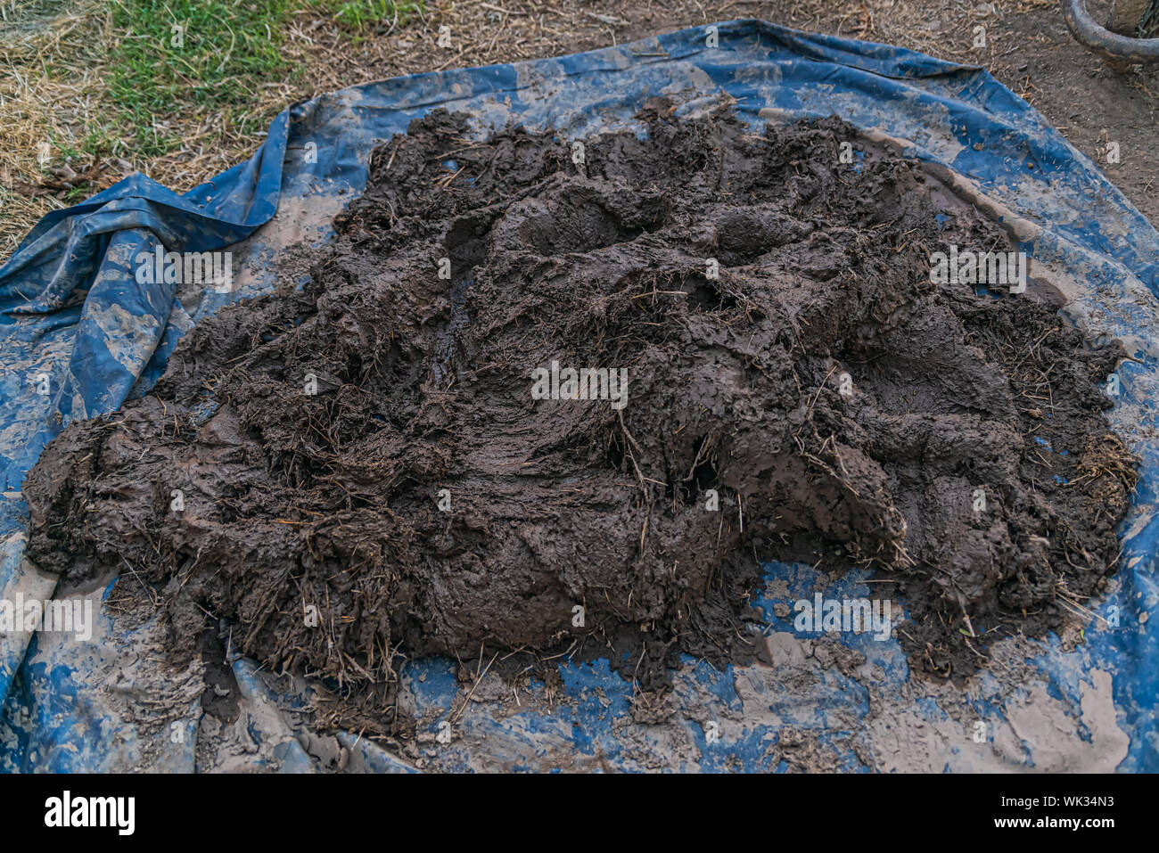Closeup of adobe mud showing detail and texture during construction ...