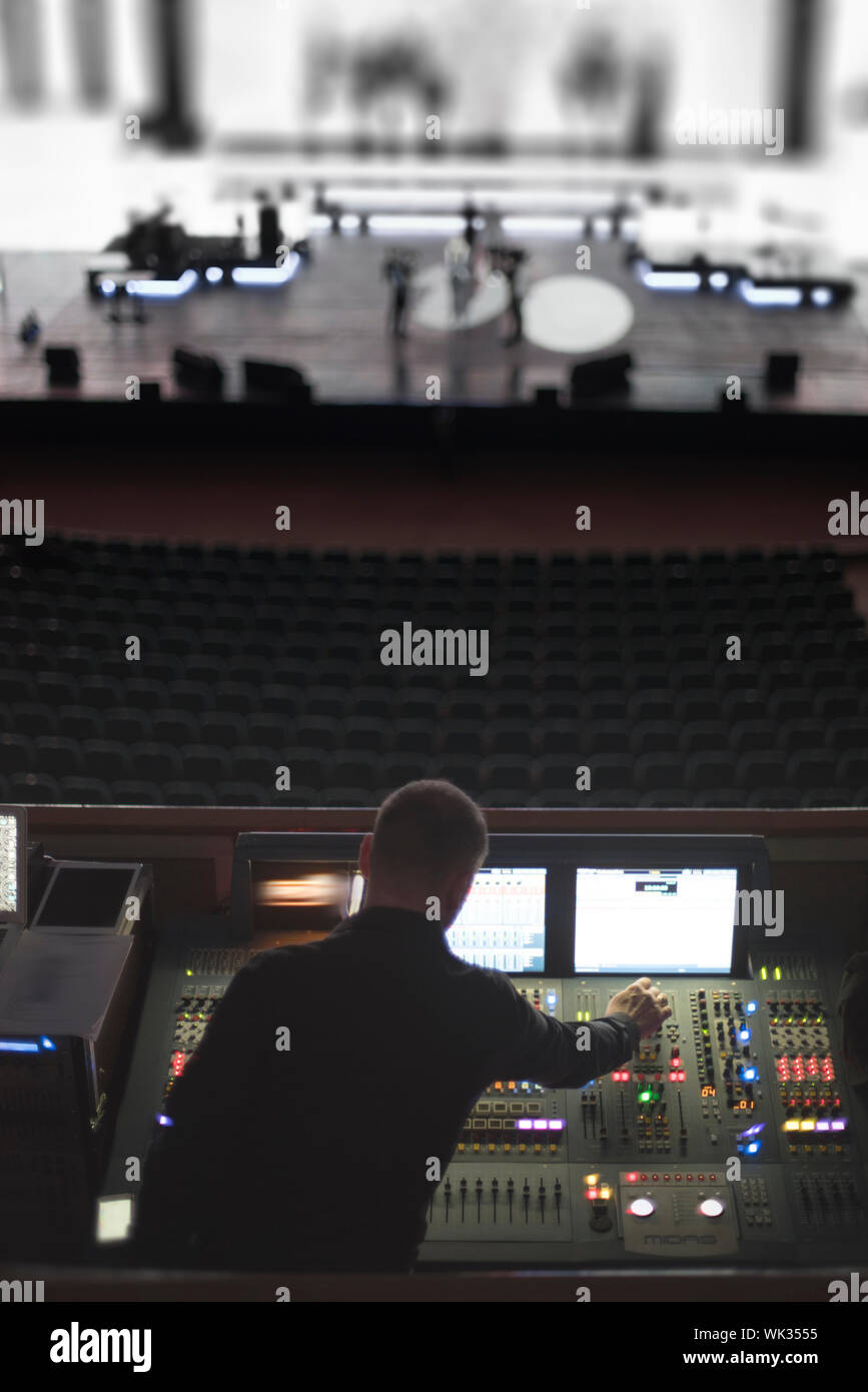 sound engineer at the console at a concert Stock Photo - Alamy