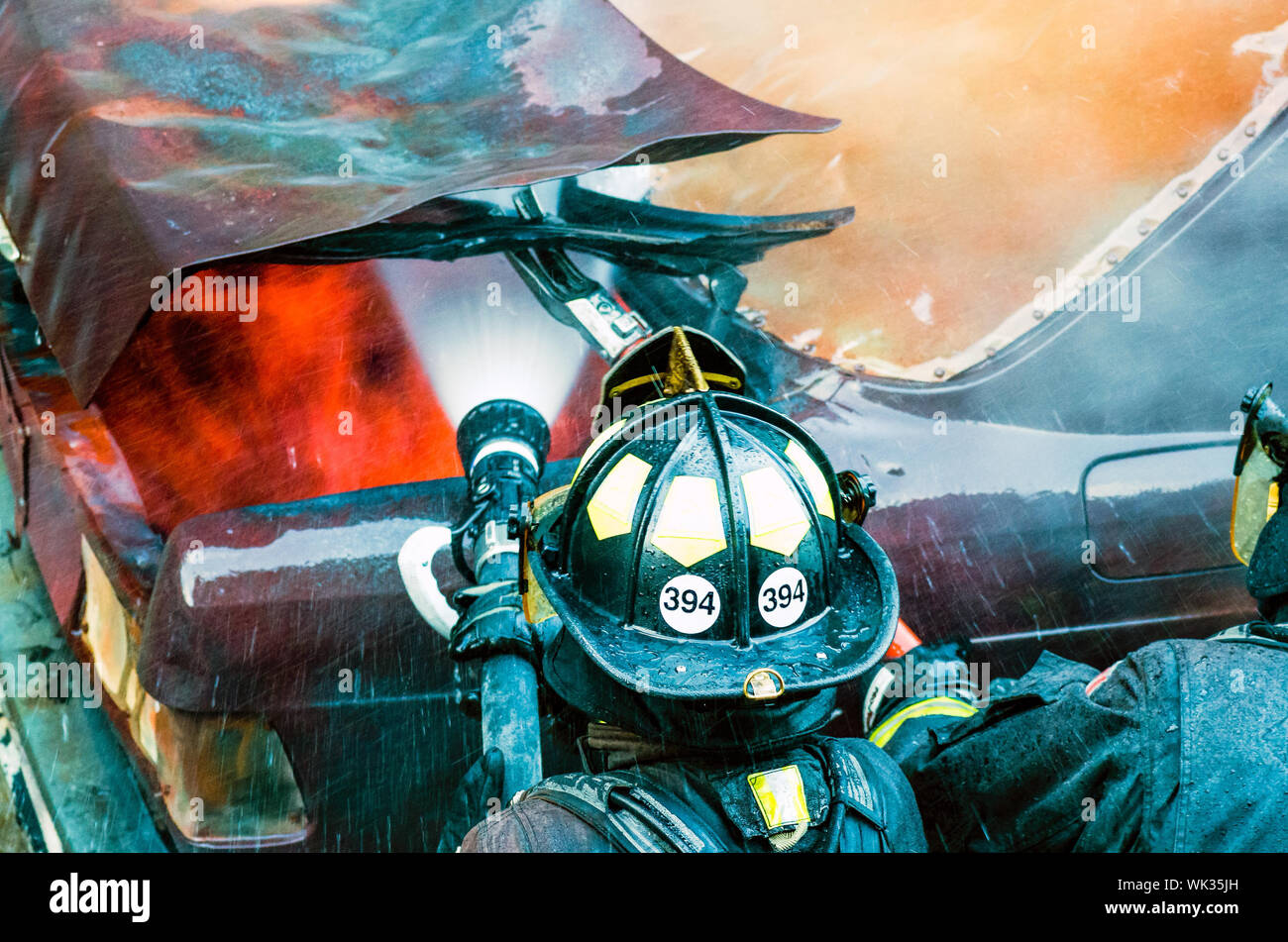 Hosing fire hi-res stock photography and images - Alamy