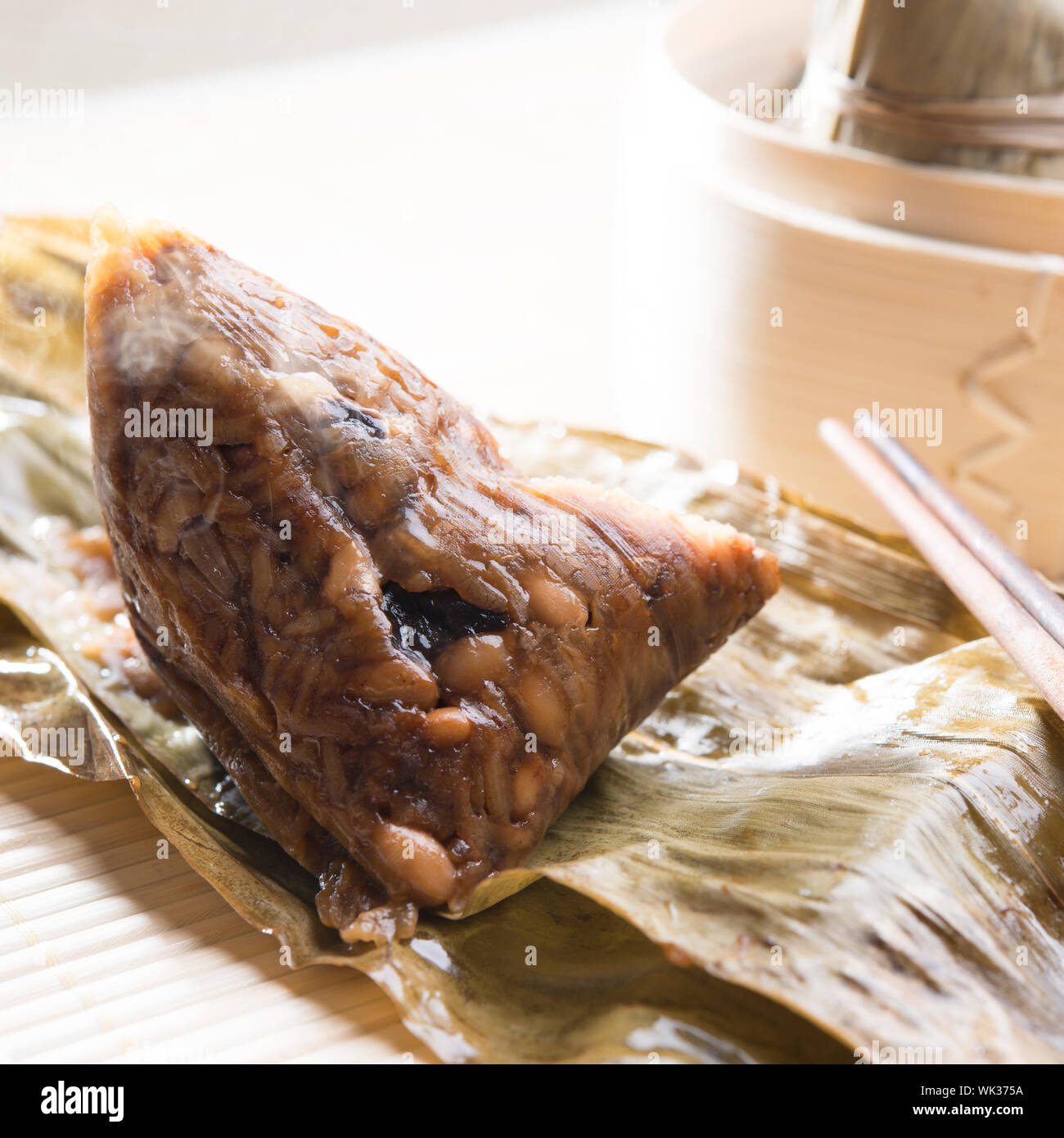 Unwrapped rice dumpling or zongzi. Traditional steamed sticky glutinous ...