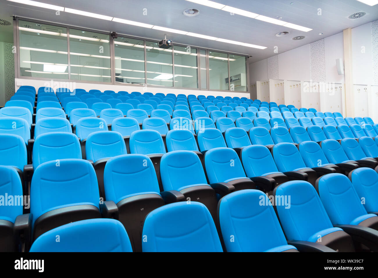 Interior of empty conference hall with blue velvet chairs Stock Photo ...