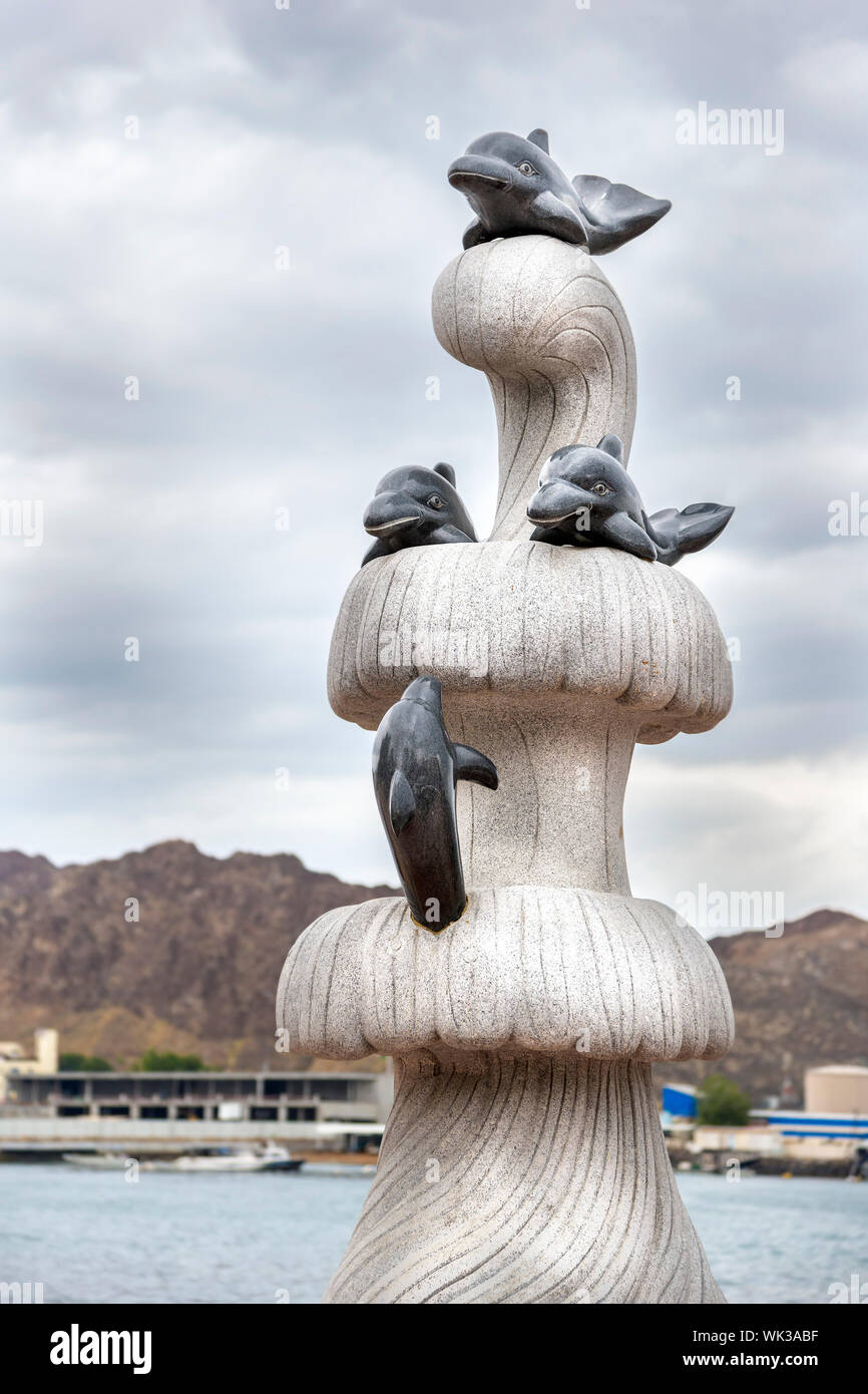 Dolphin statue in Muscat, Oman Stock Photo - Alamy