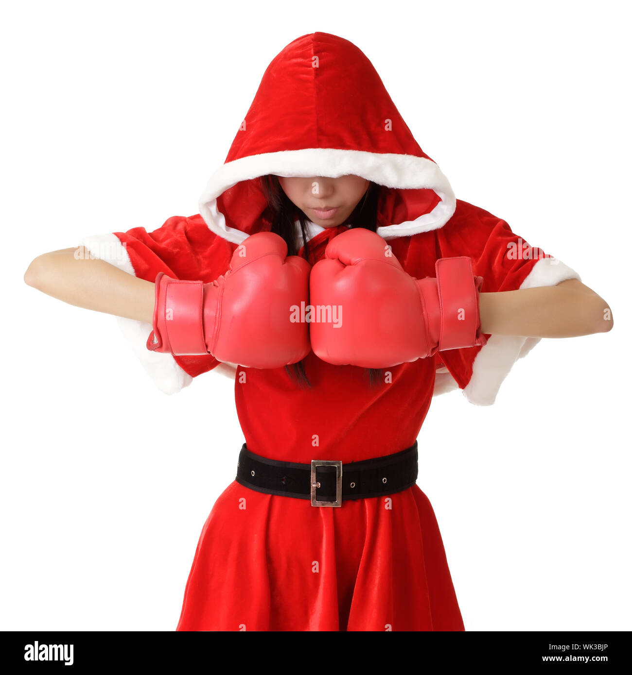 Christmas girl with boxing gloves posing over white background Stock ...
