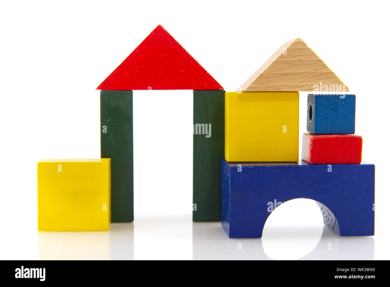 Built house from colorful blocks isolated over white Stock Photo - Alamy