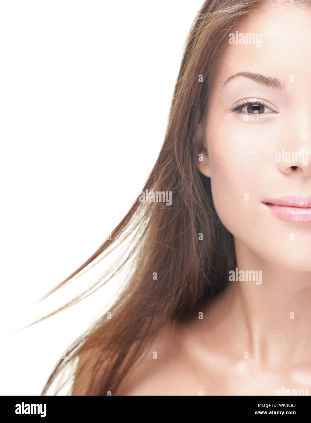 Half woman face with copy-space on side. Beautiful asian caucasian ...