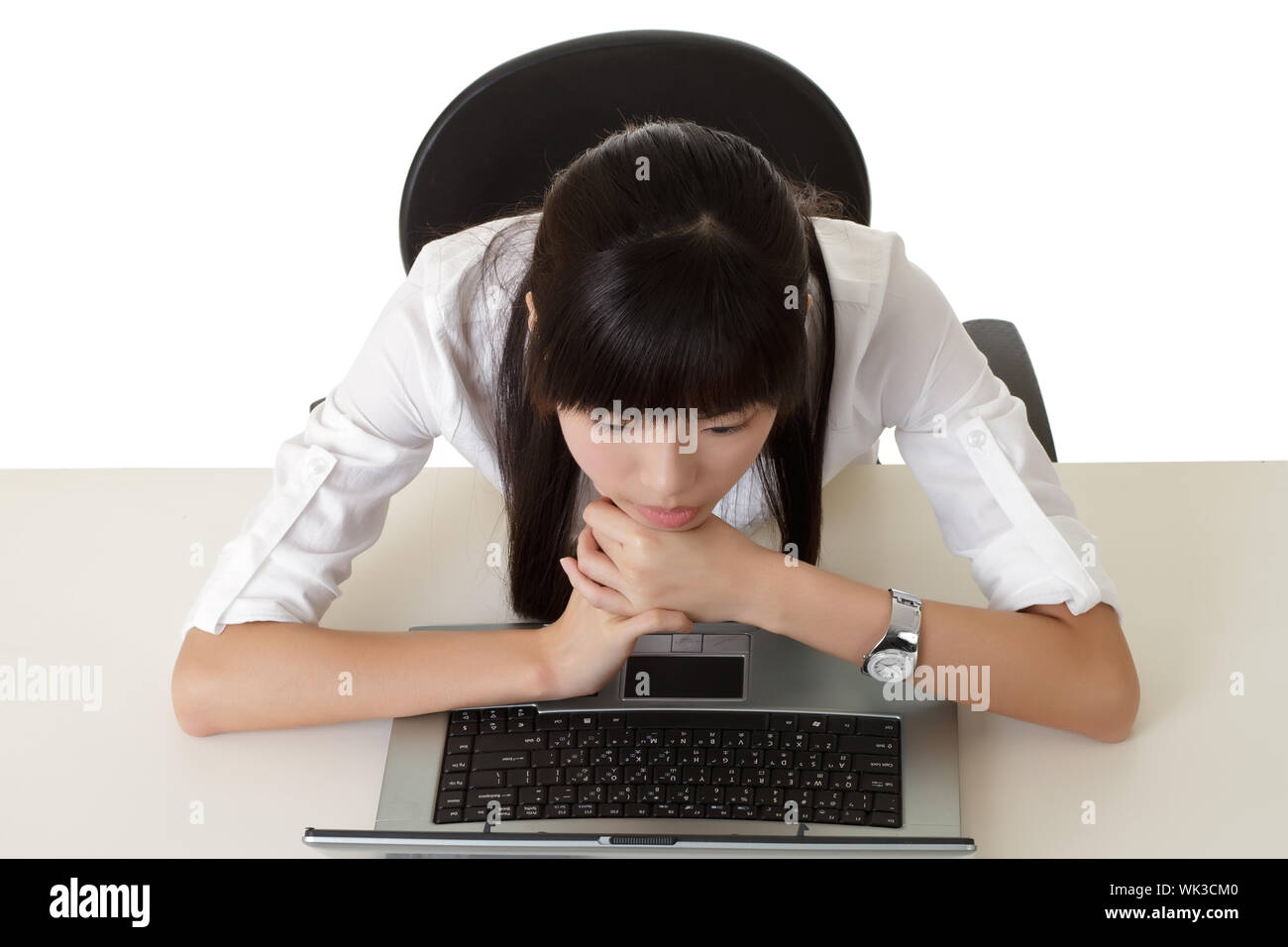 Boring business woman working and looking screen in laptop Stock Photo ...
