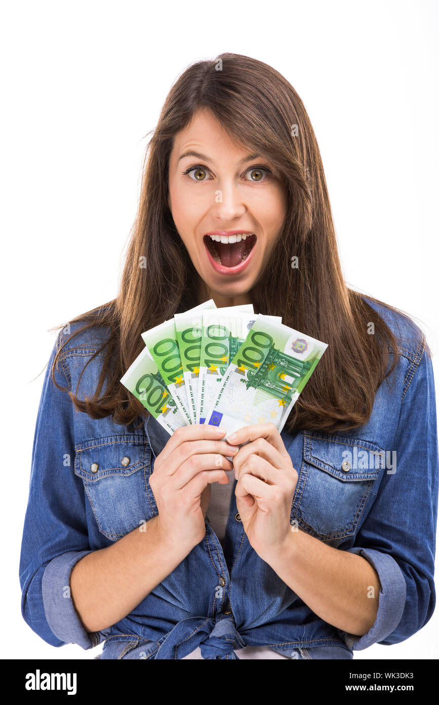 Woman holding euro currency notes Stock Photo - Alamy