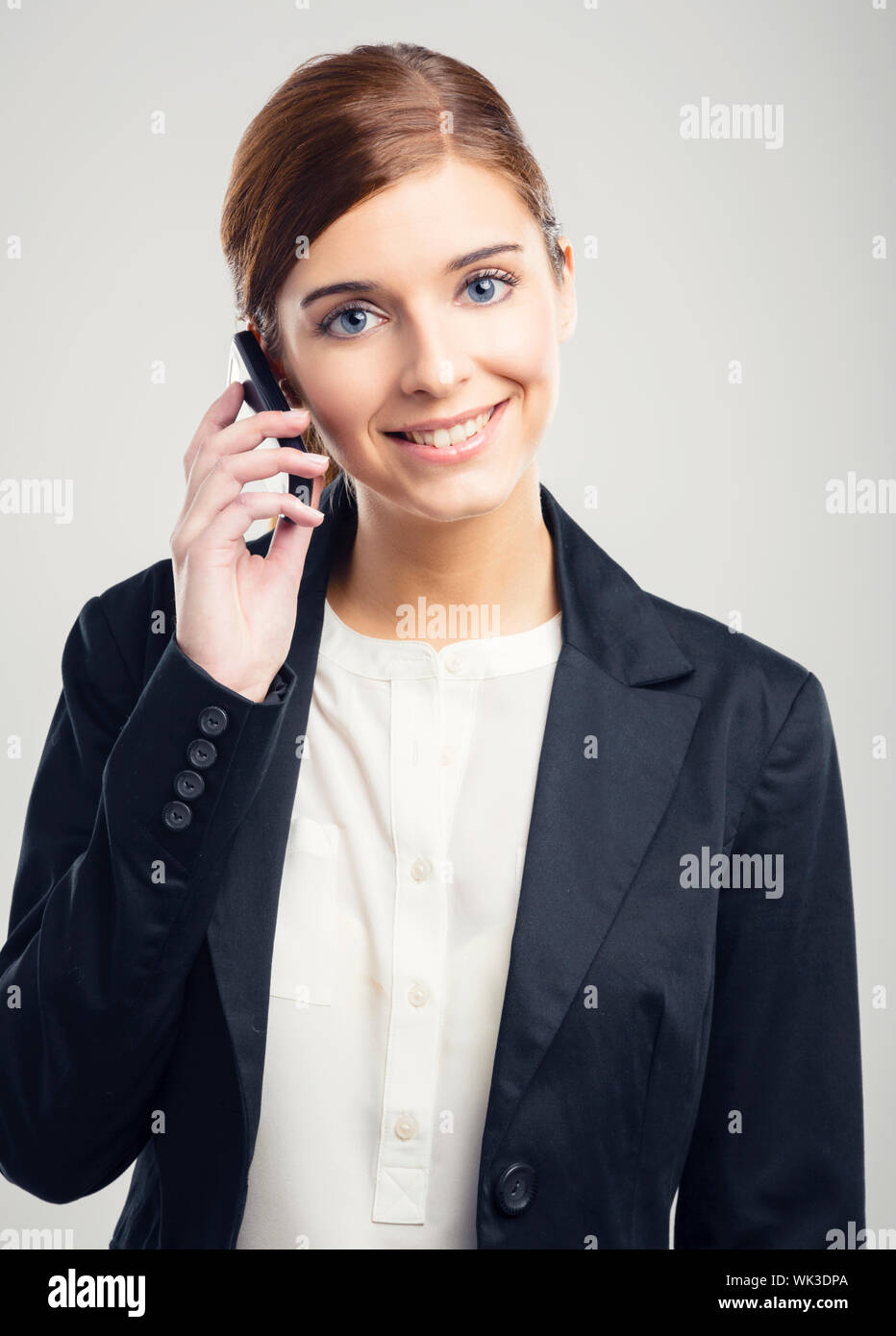 Beautiful business woman making a phone call Stock Photo - Alamy