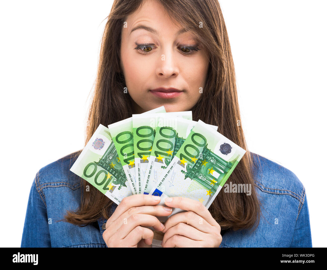 Beauitful woman holding some Euro currency notes, isolated over white ...