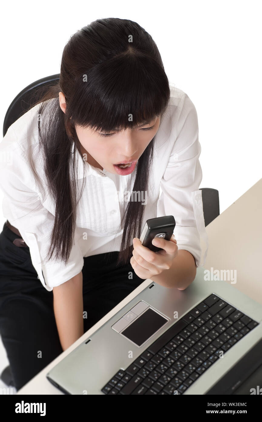 Business woman yell at cellphone in office Stock Photo - Alamy