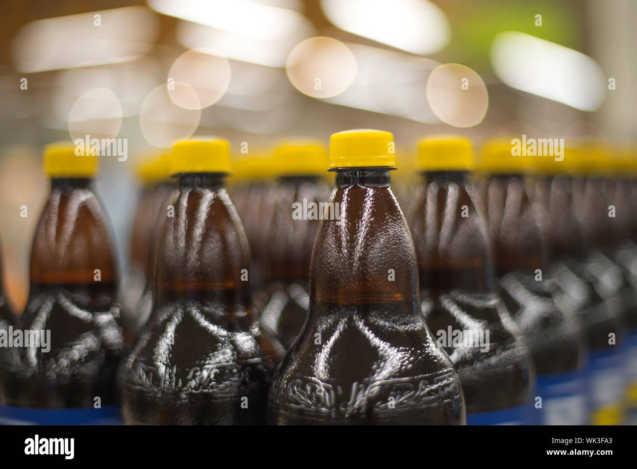 bottles in the store are in a row Stock Photo - Alamy