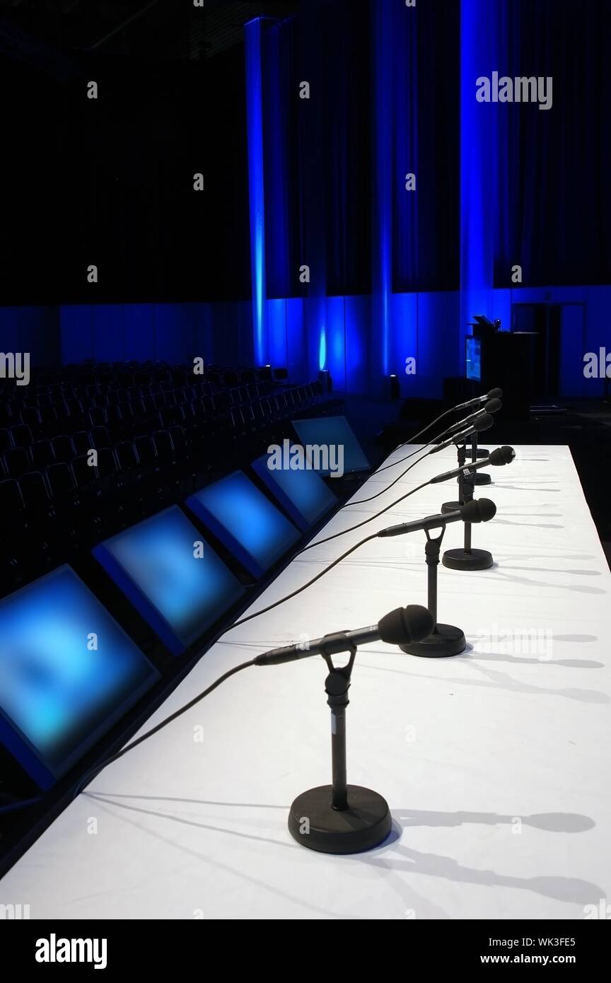 conference room with microphones on the table Stock Photo - Alamy