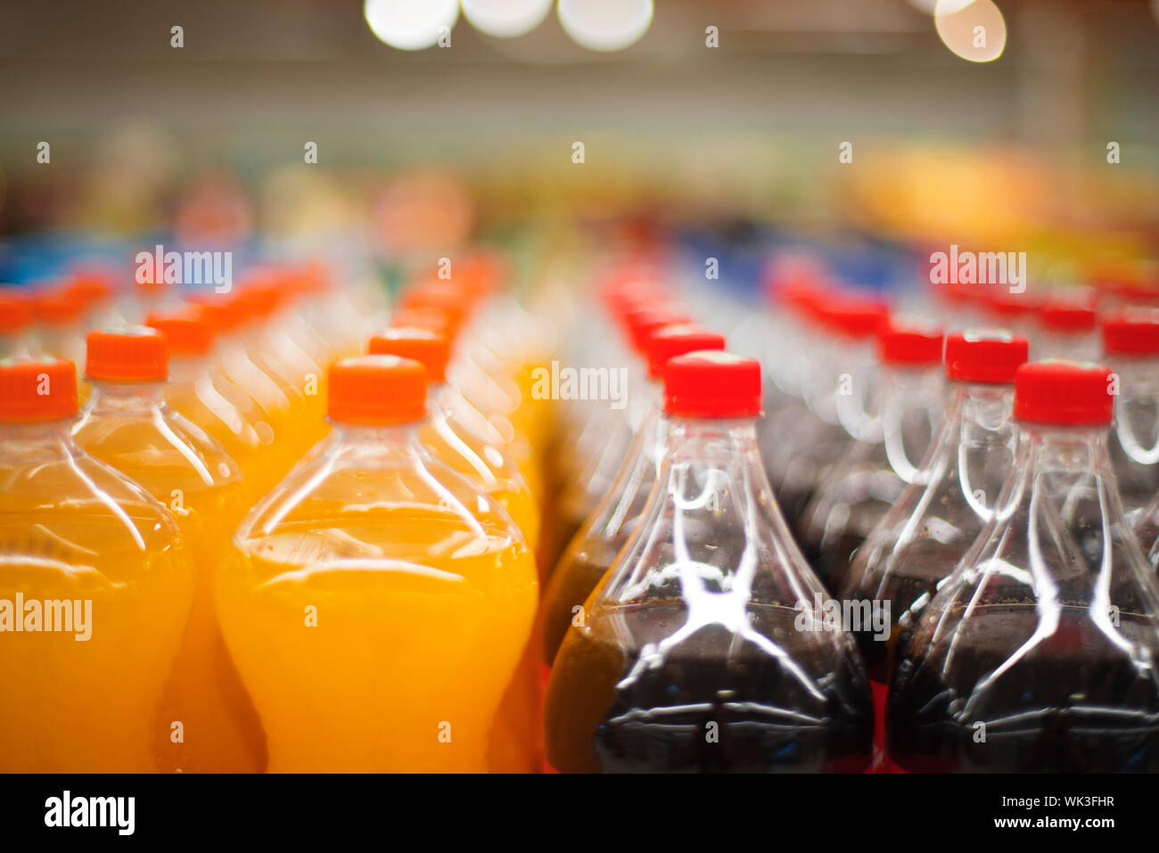 bottles in the store are in a row Stock Photo - Alamy
