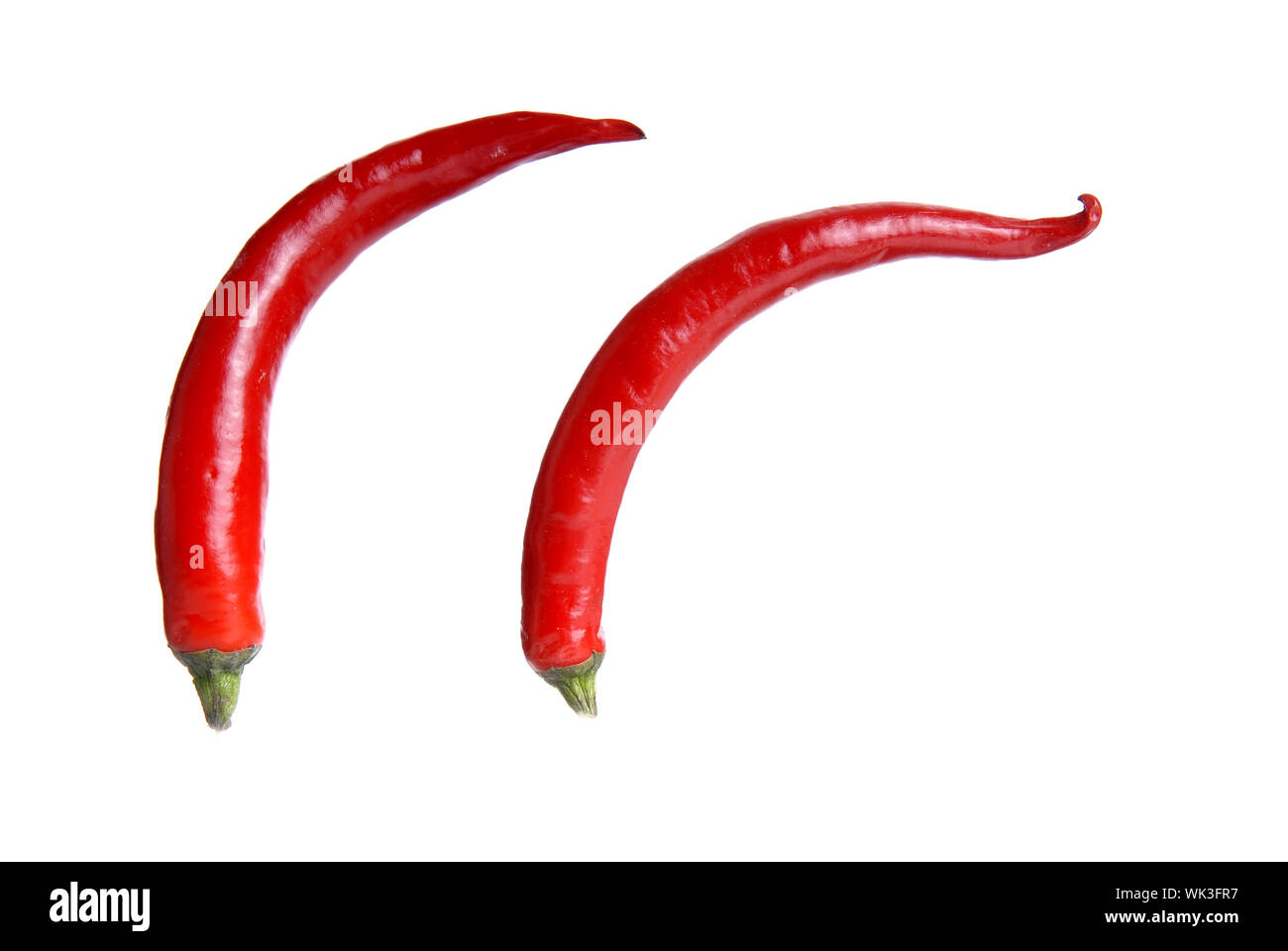 Two peppers isolated over white Stock Photo - Alamy