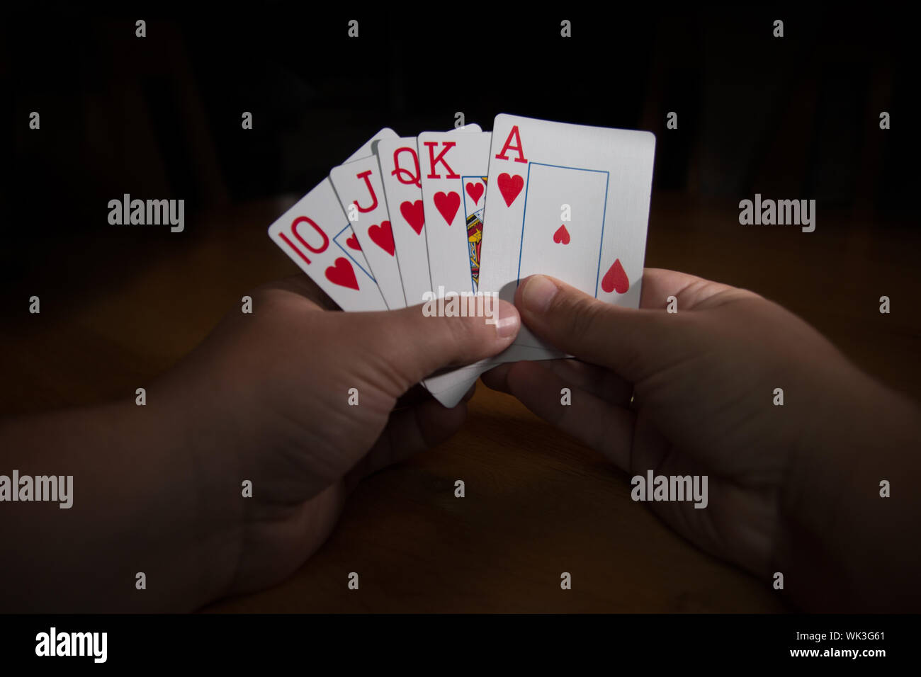 Winning hand of cards hi-res stock photography and images - Alamy