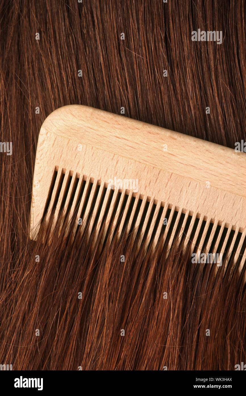 Close up hairdresser combing woman hi-res stock photography and images ...