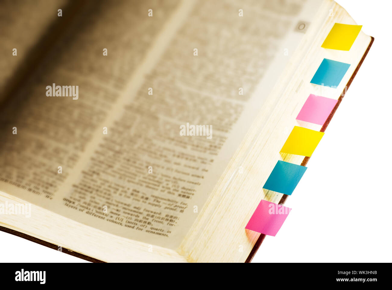 Here are a lot of tags on book pages with white background Stock Photo ...