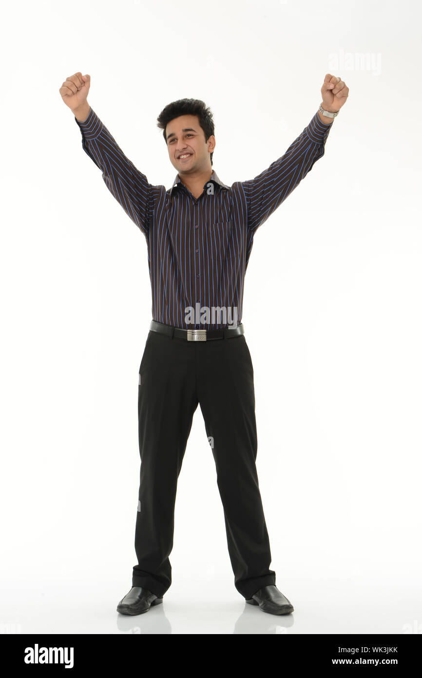 Standing smiling happiness looking away celebration hi-res stock ...