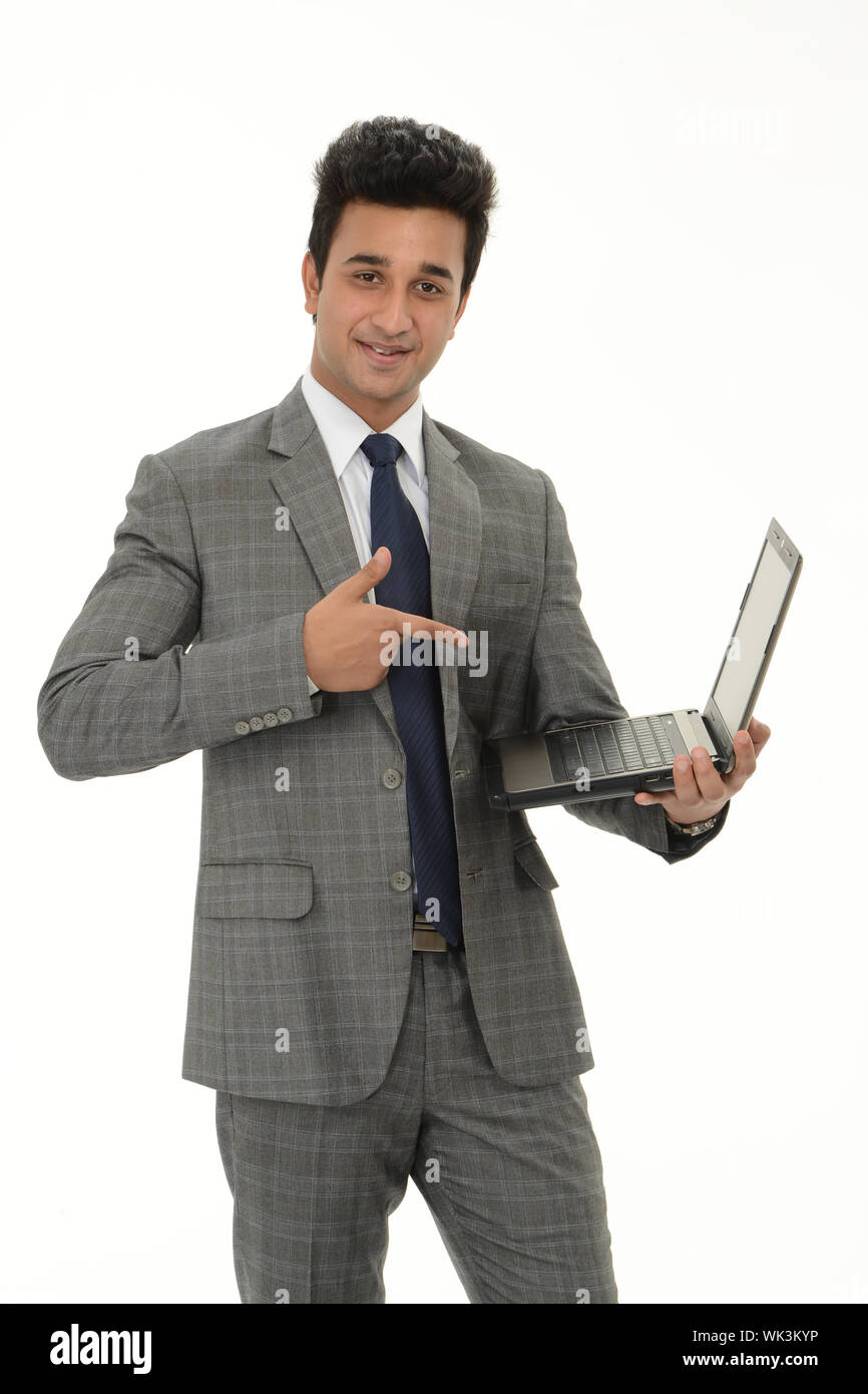 Salesman showing a laptop Stock Photo - Alamy